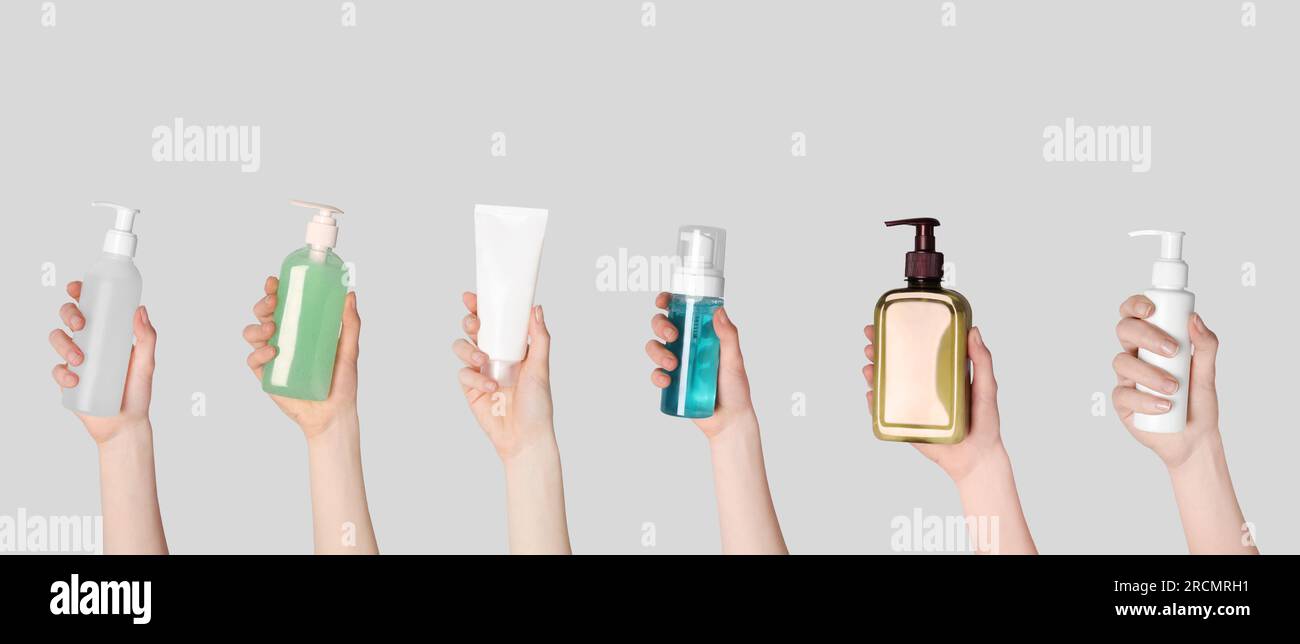 Face and body wash. Women holding bottles and tube of different ...