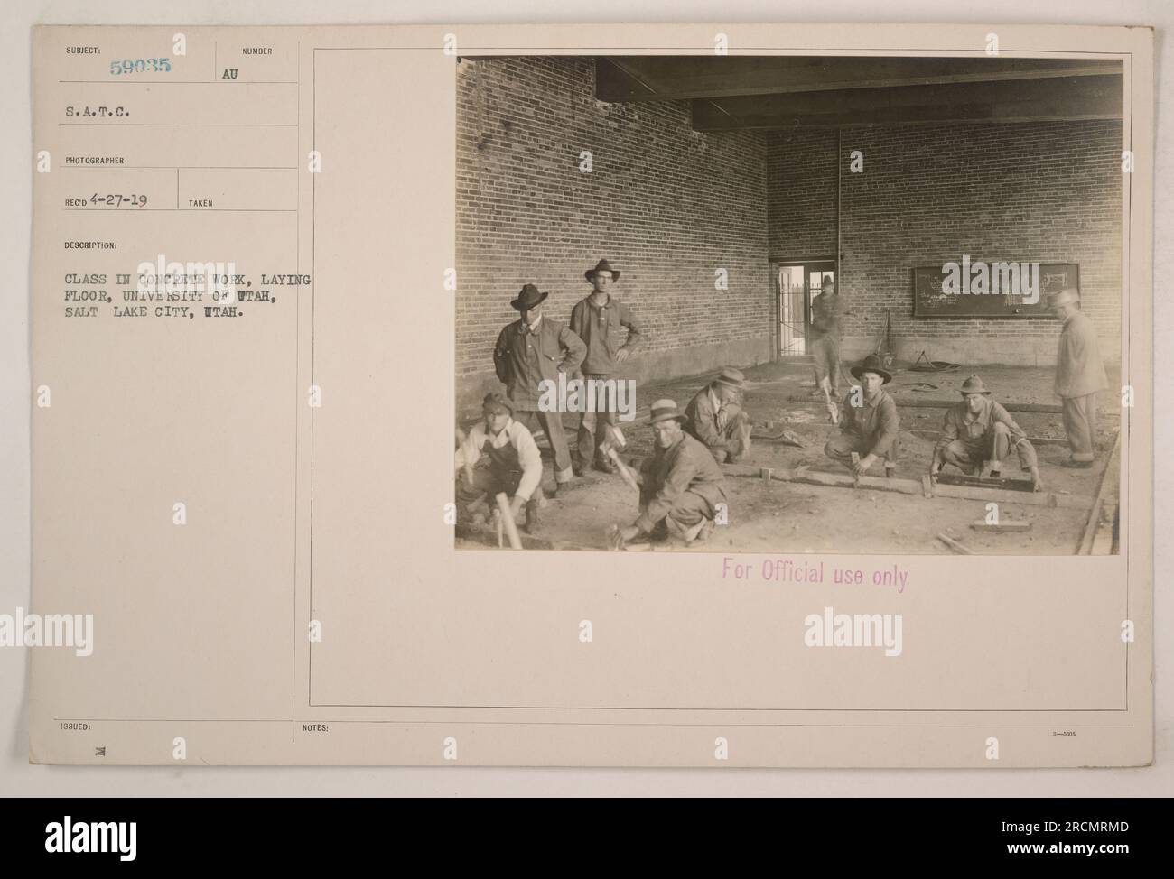 Soldiers participating in a class on concrete work, specifically floor ...