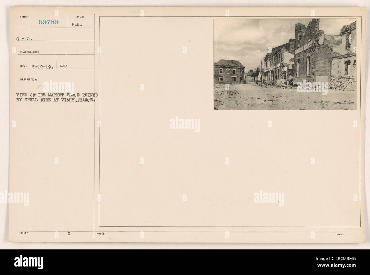 This photograph shows the Market Place in Vimy, France, which has been ...