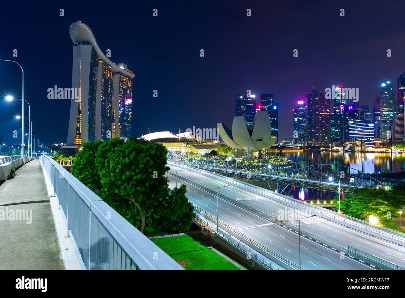 Singapore by night including the Marina Bay Sands Hotel, seen from an ...