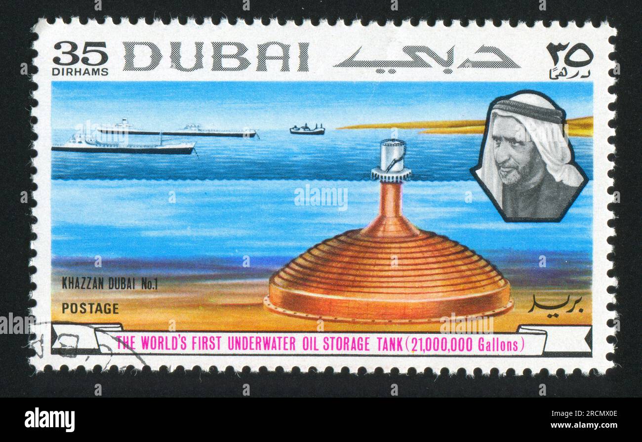 DUBAI - CIRCA 1983: stamp printed by Dubai, shows underwater oil ...