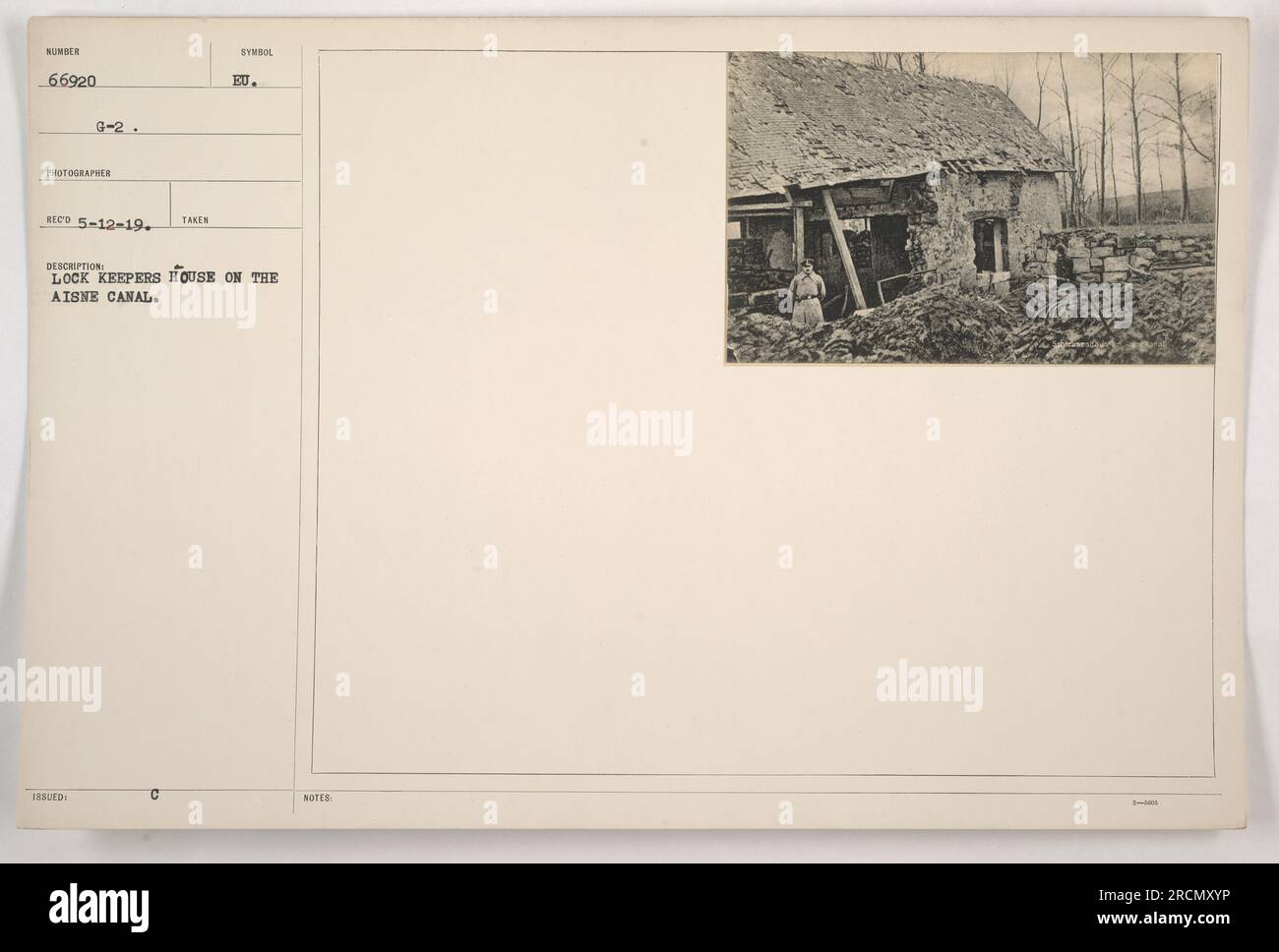 The image shows a lock keeper's house situated on the Aisne Canal in ...