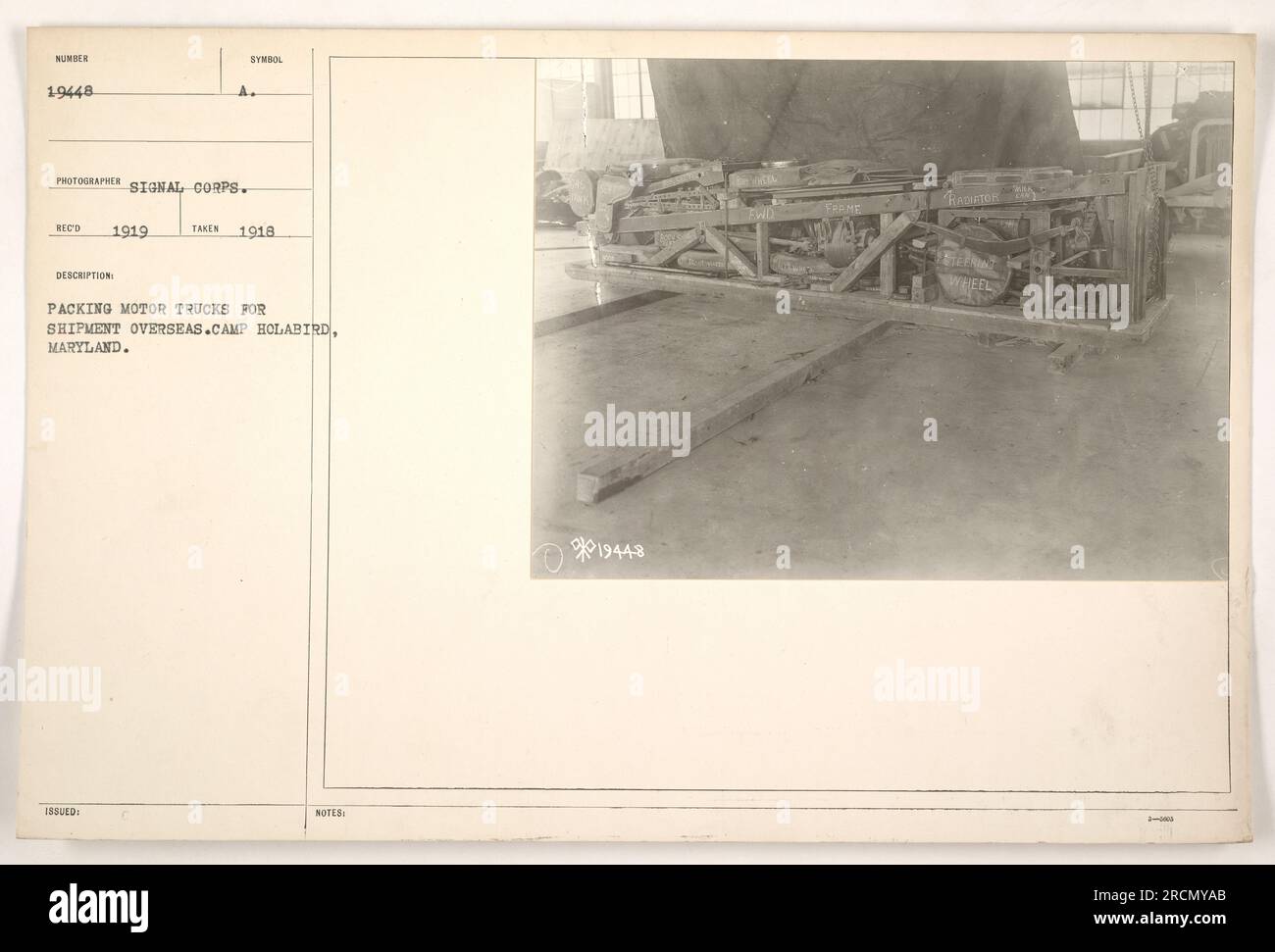 Soldiers at Camp Holabird, Maryland, packing motor trucks for shipment ...