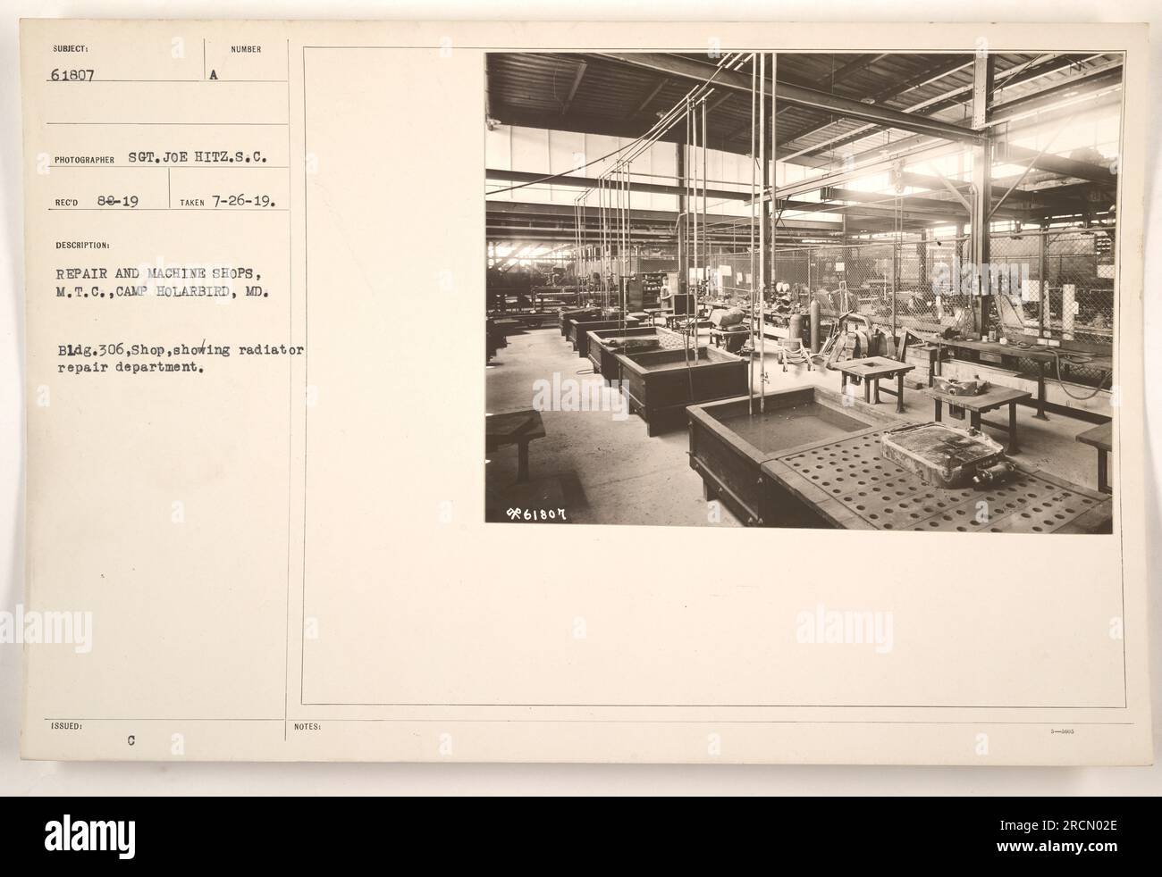 The image shows Building 306 at the Repair and Machine Shops in Camp ...