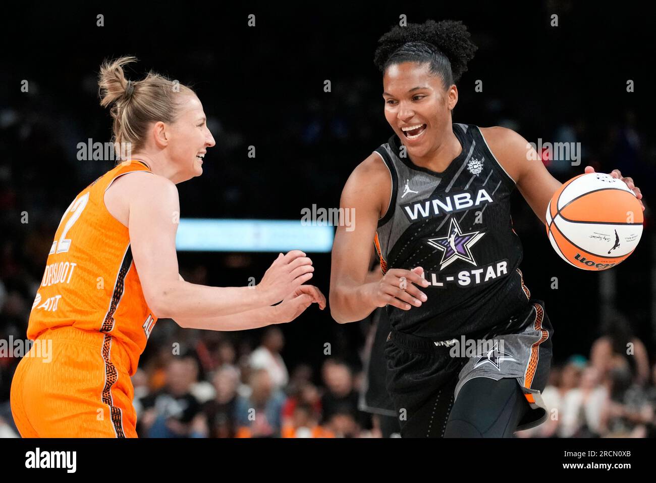 Connecticut Sun's Alyssa Thomas, of Team Wilson, right, drives against ...