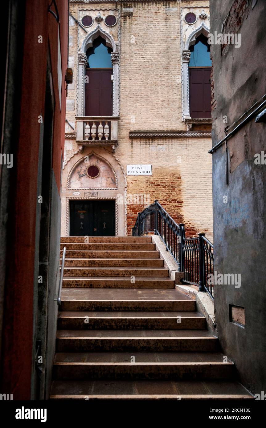 Gothic ogee window and marble tympanum, Ponte de Ca' Bernardo in Venice ...