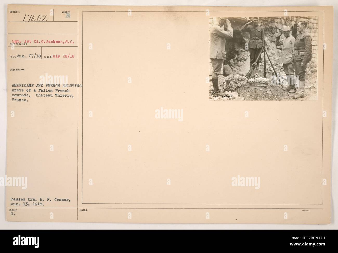 Americans and French soldiers pay their respects to a fallen French ...