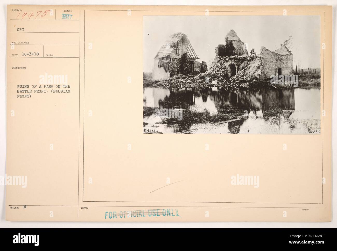 Soldiers surveying the ruins of a farm on the battlefront during World ...