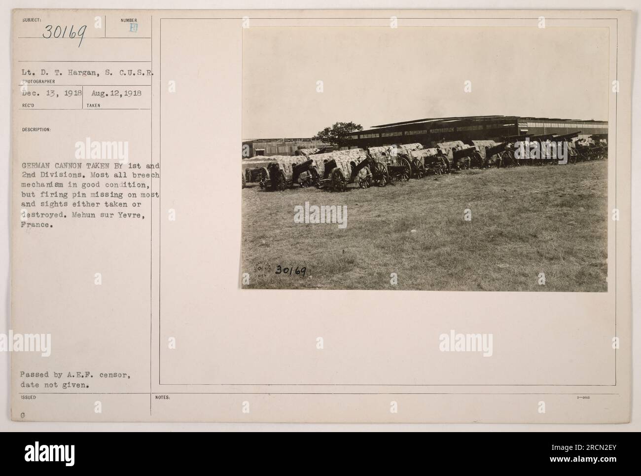 This photograph captures a captured German cannon in Mehun sur Yevre ...