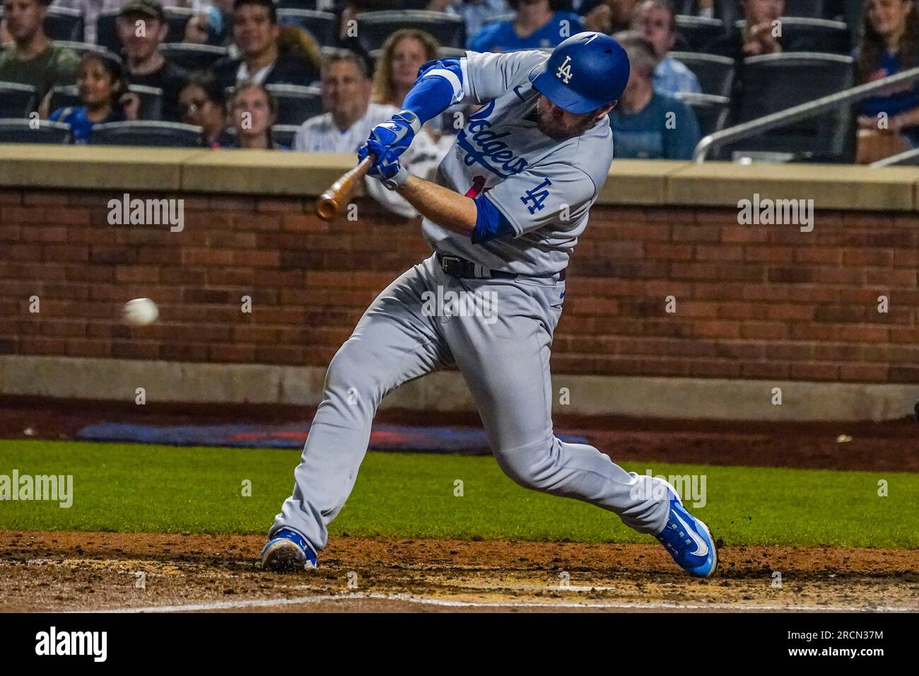 Los Angeles Dodgers Max Muncy hits a single during the eight inning of ...