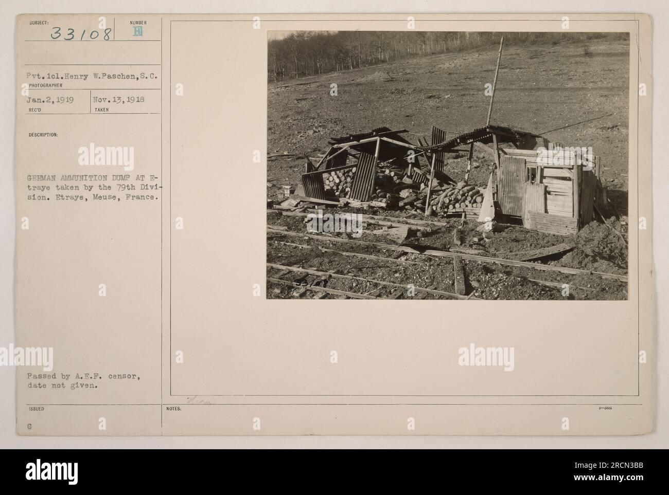 Pvt. 1cl. Henry W. Paschen was photographed at a German ammunition dump ...