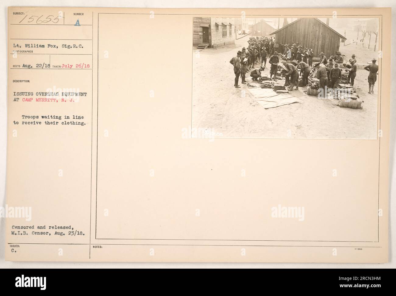 Troops waiting in line to receive their clothing and equipment at Camp ...