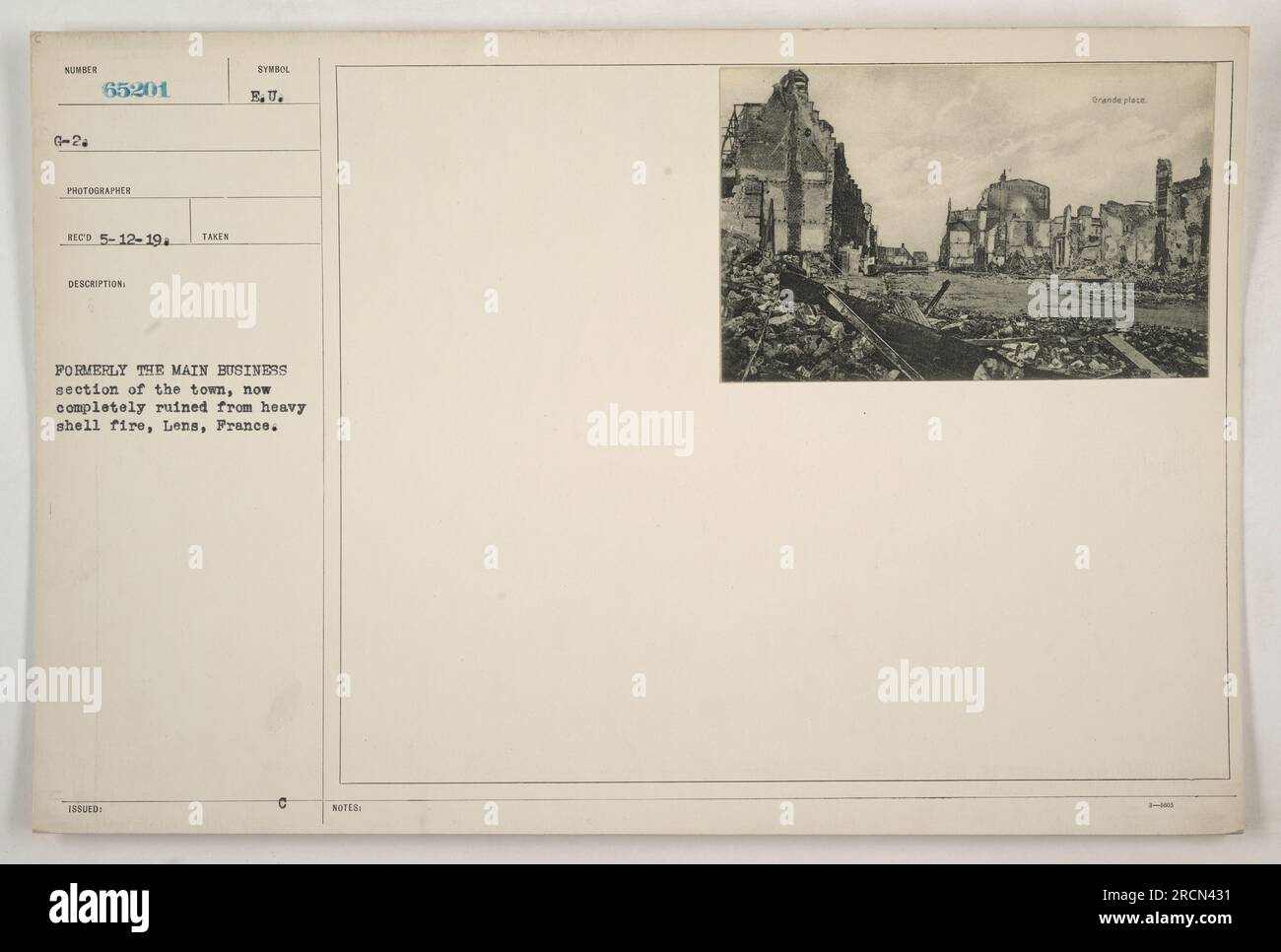 The image shows the aftermath of heavy shell fire on the main business ...