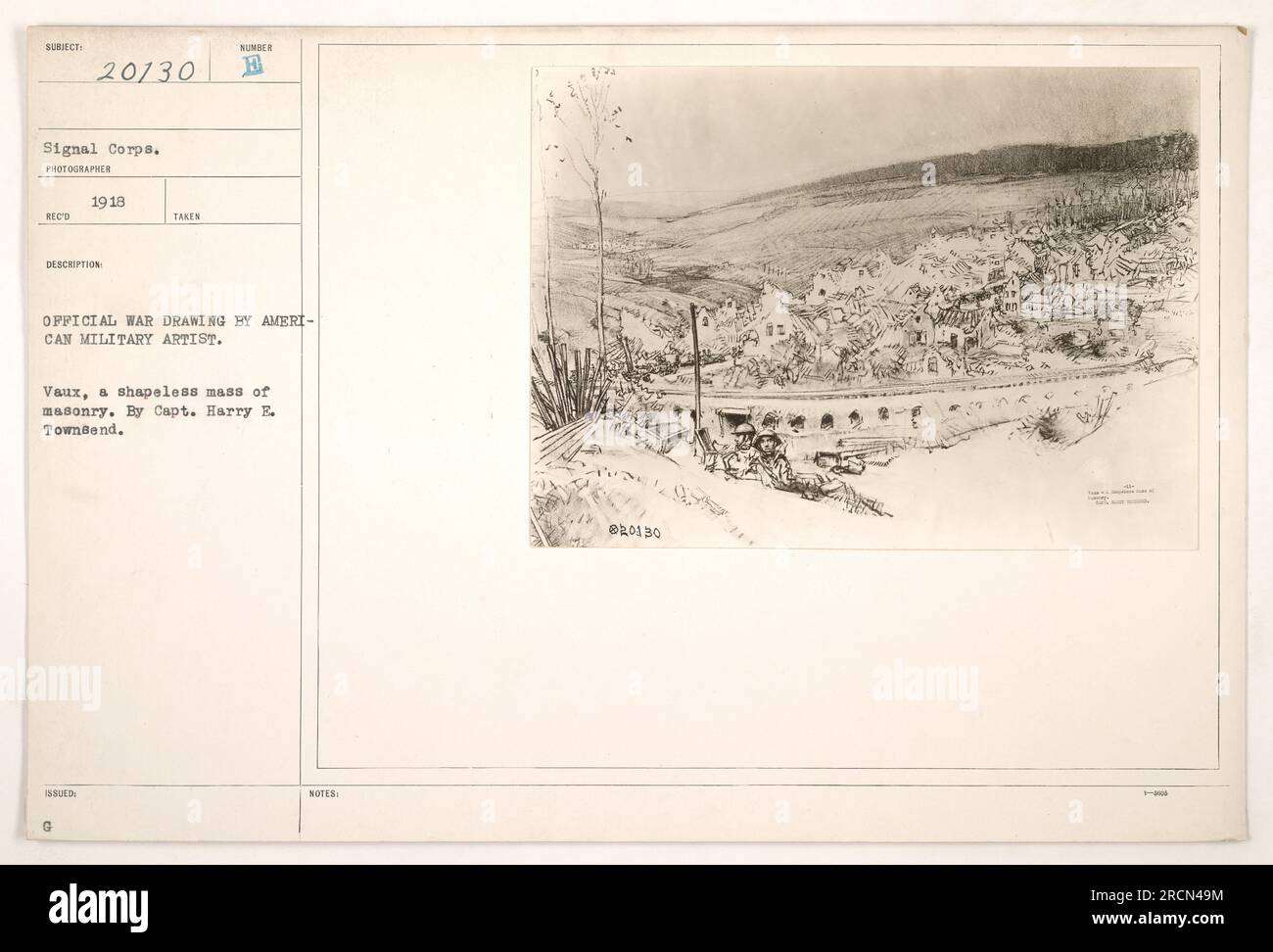 A soldier examines an official war drawing by American military artist ...