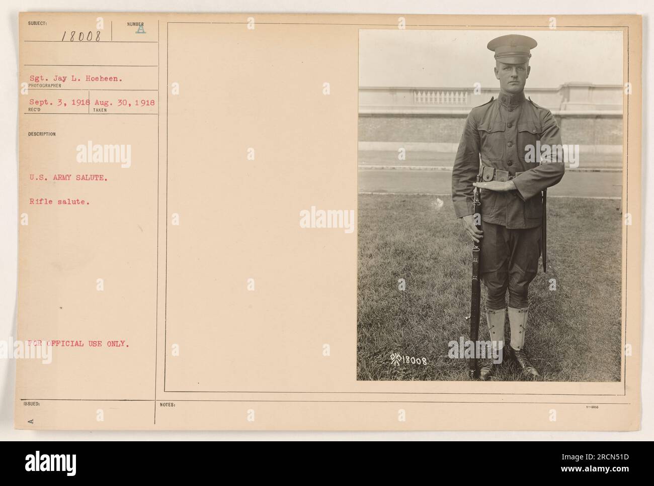 Sgt. Jay L. Hoe heen of the U.S. Army performing a rifle salute during ...