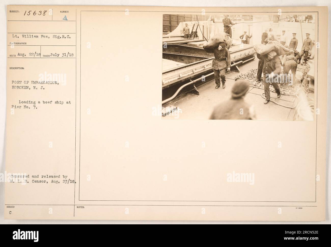 A group of soldiers loading a beef ship at Pier No. 7 in the Port of ...