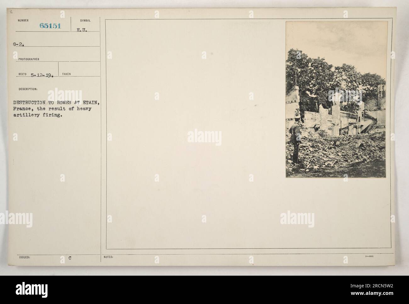 This photograph depicts the destruction caused to homes in Etain ...