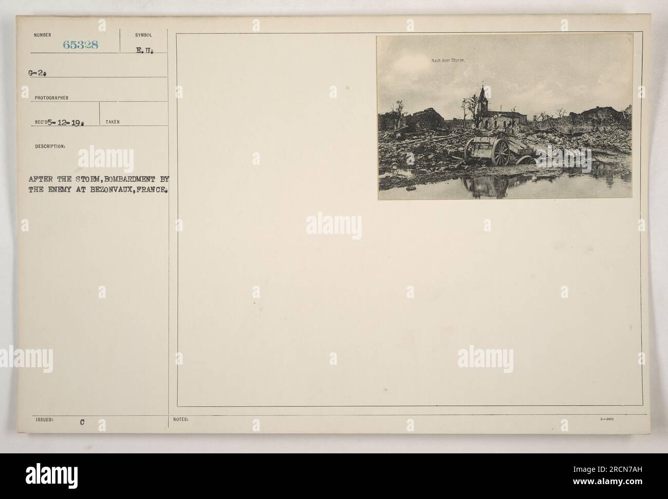 Caption: "A photograph showing the aftermath of a bombardment by the ...