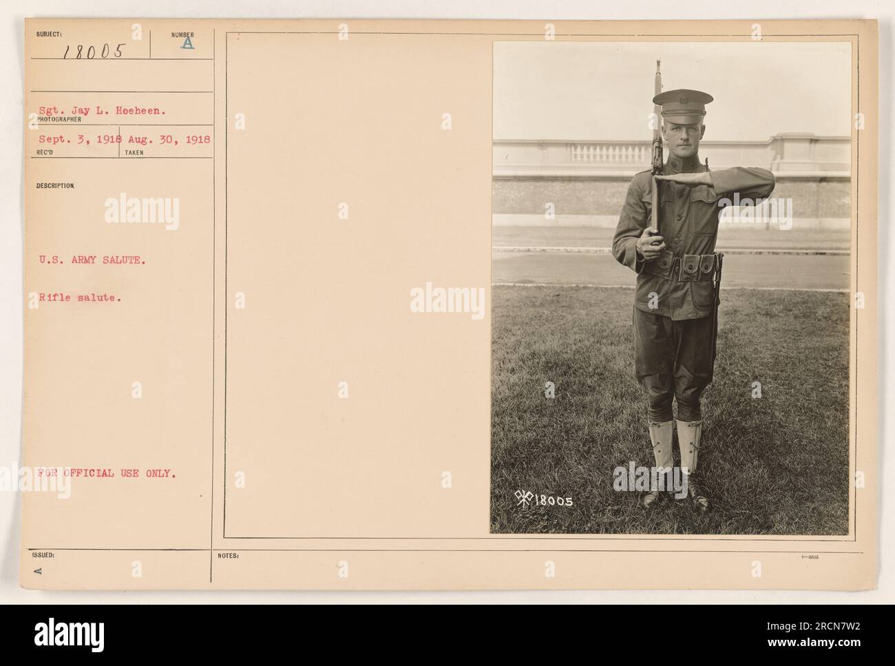 Sgt. Jay L. Hoeheen of the U.S. Army performing a rifle salute ...