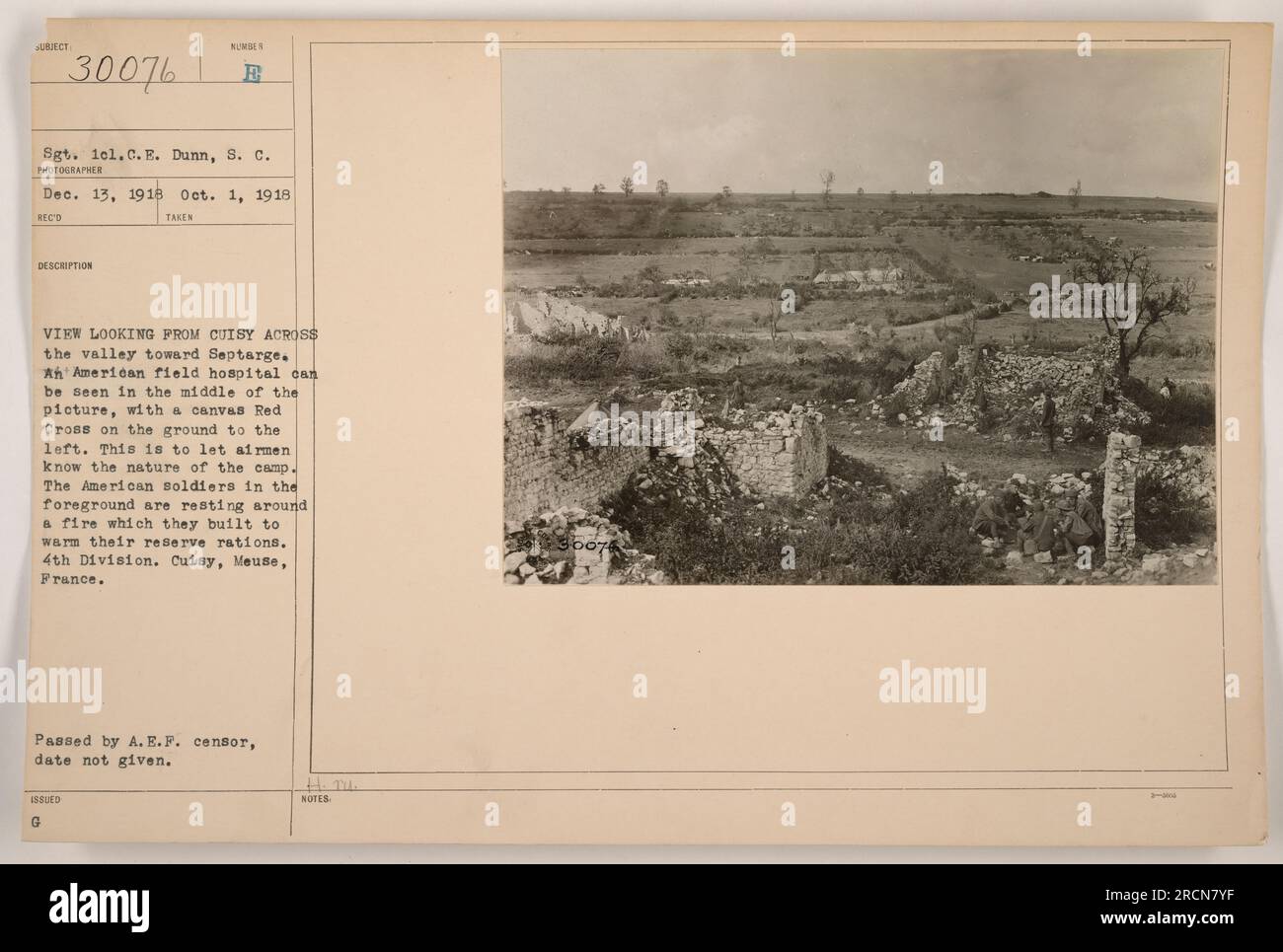 American soldiers resting near a fire they built to warm their reserve ...