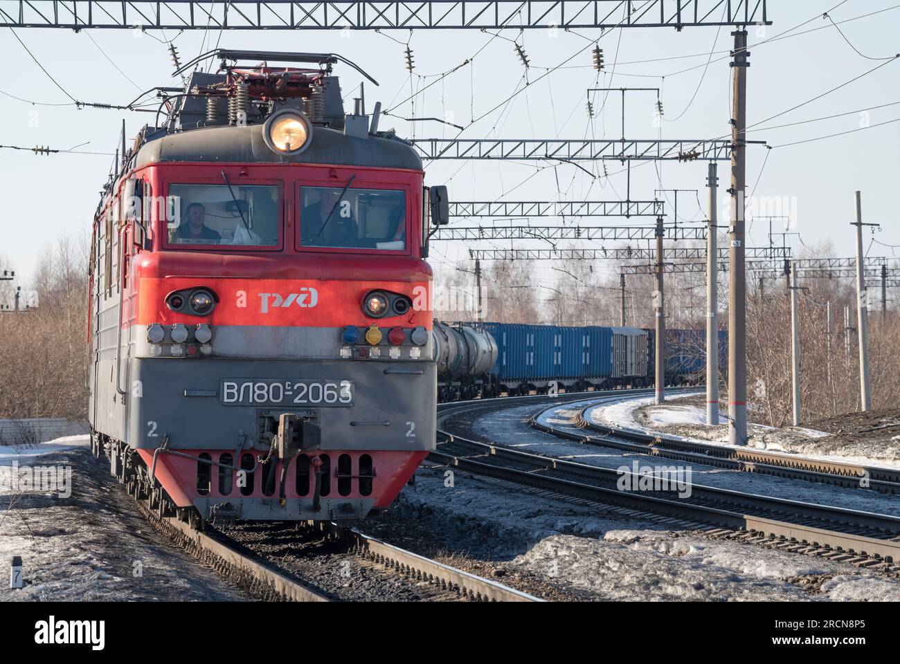 SHARYA, RUSSIA - MARCH 18, 2022: VL-80S electric locomotive with a ...