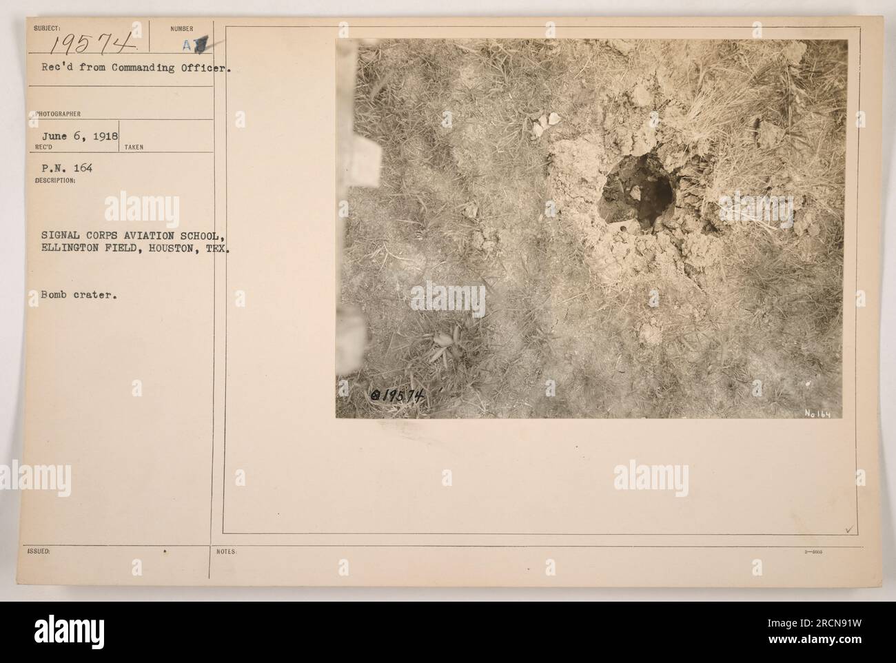 A photograph of a bomb crater at the Signal Corps Aviation School in ...