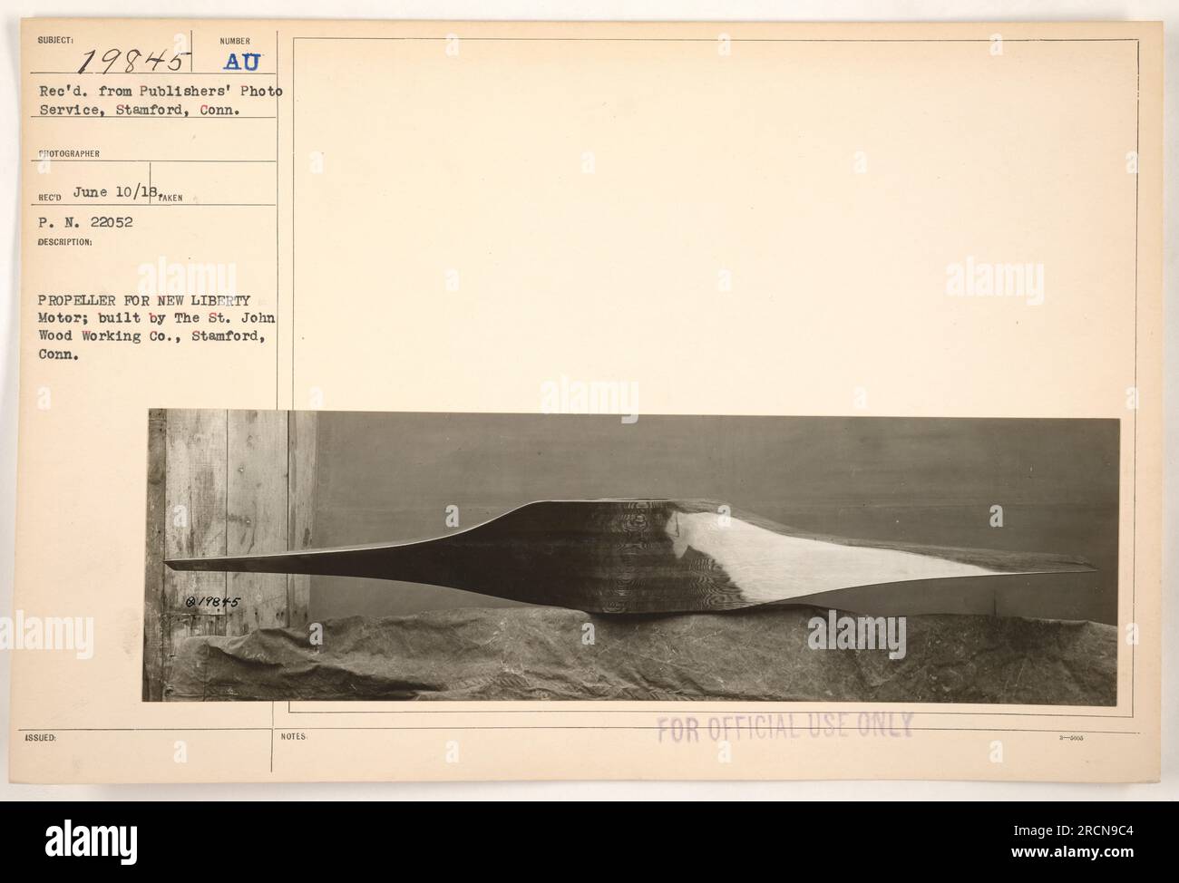 Image showcasing American military personnel inspecting a new propeller ...