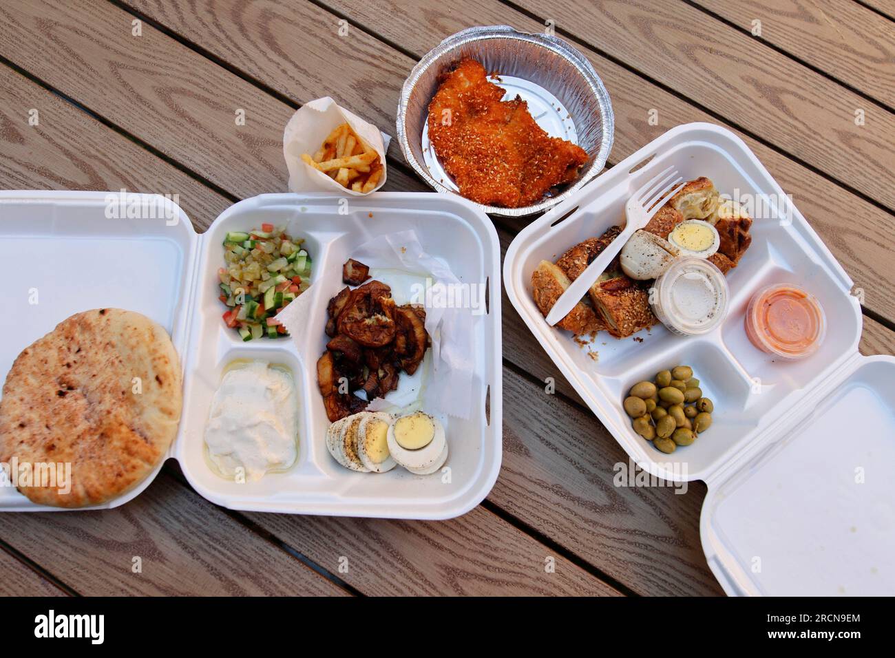 A sabich plate, fries, schnitzel, and a potato burkea from the Tarzana ...