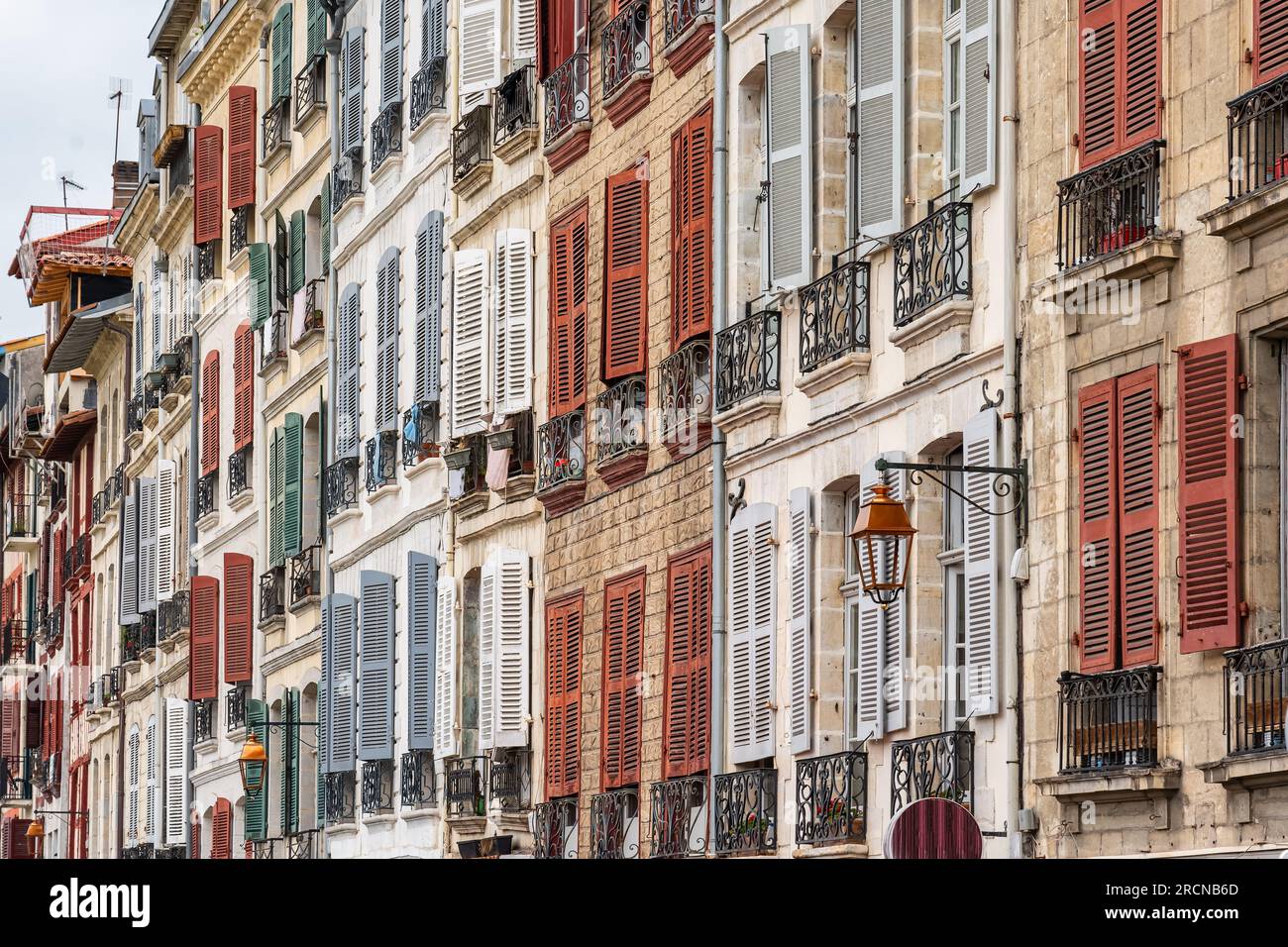 Typical facades with picturesque windows and ancient architecture in ...