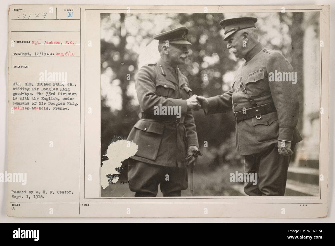 In this photograph, Major General George Bell, Jr. is saying goodbye to ...
