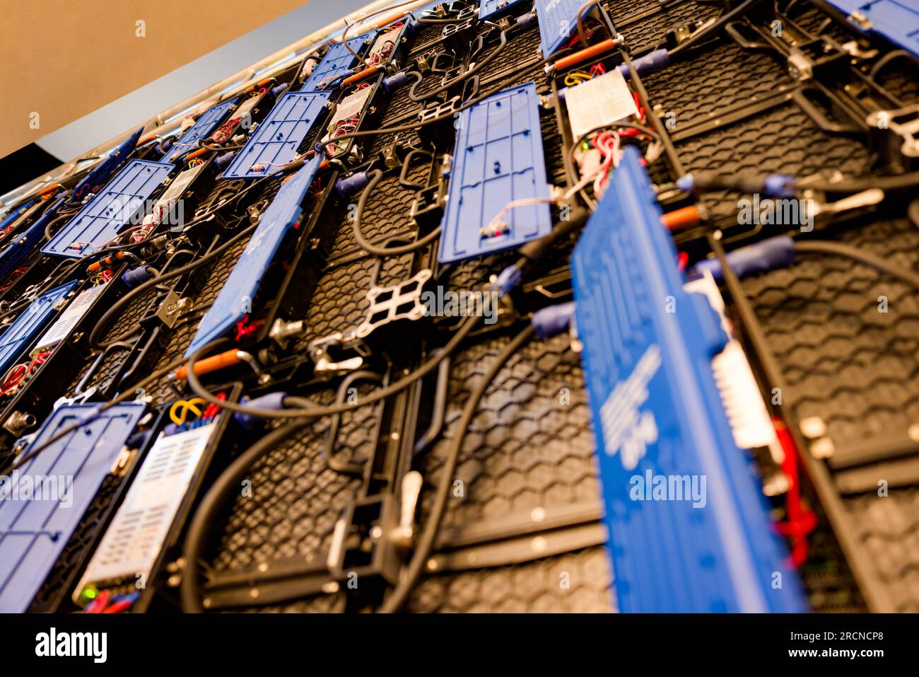 electronics and wiring from modules of a video wall, view from the back ...