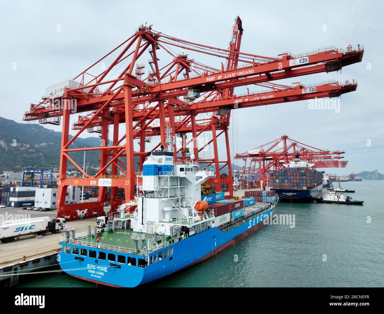 LIANYUNGANG, CHINA - JULY 16, 2023 - Cargo ships load and unload ...
