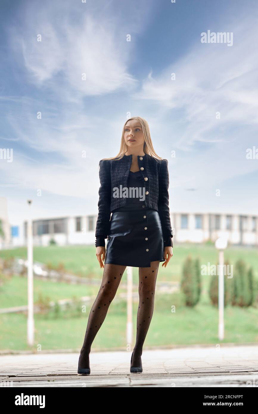 Full length urban portrait of confident woman outdoors Stock Photo - Alamy