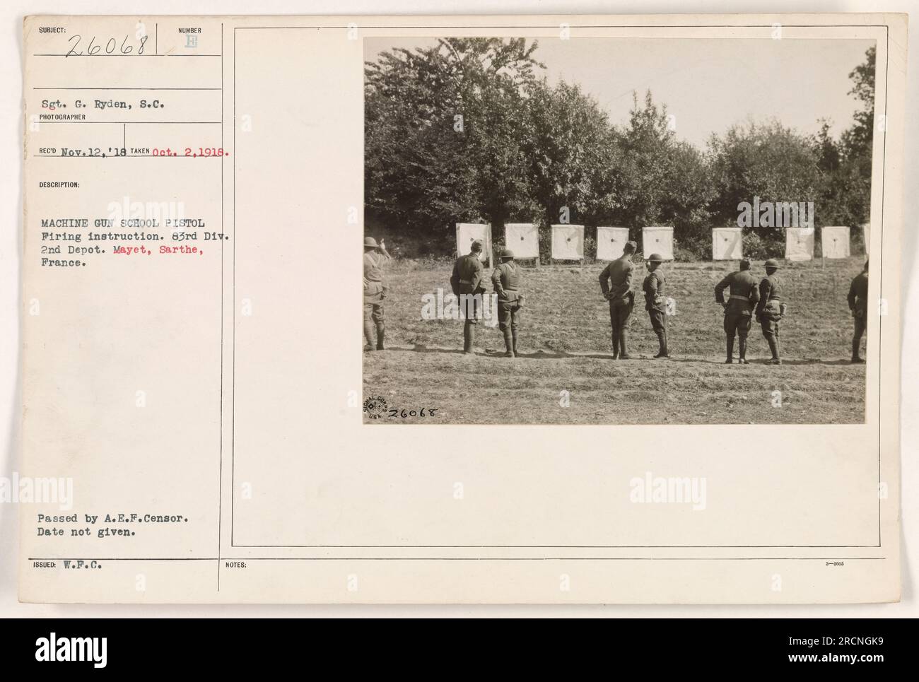 Sgt. G. Ryden of the Signal Corps receiving pistol firing instruction ...
