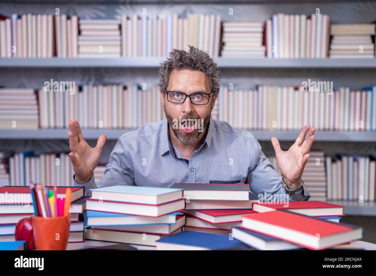 back to school. The teacher at the classroom workplace. hispanic ...