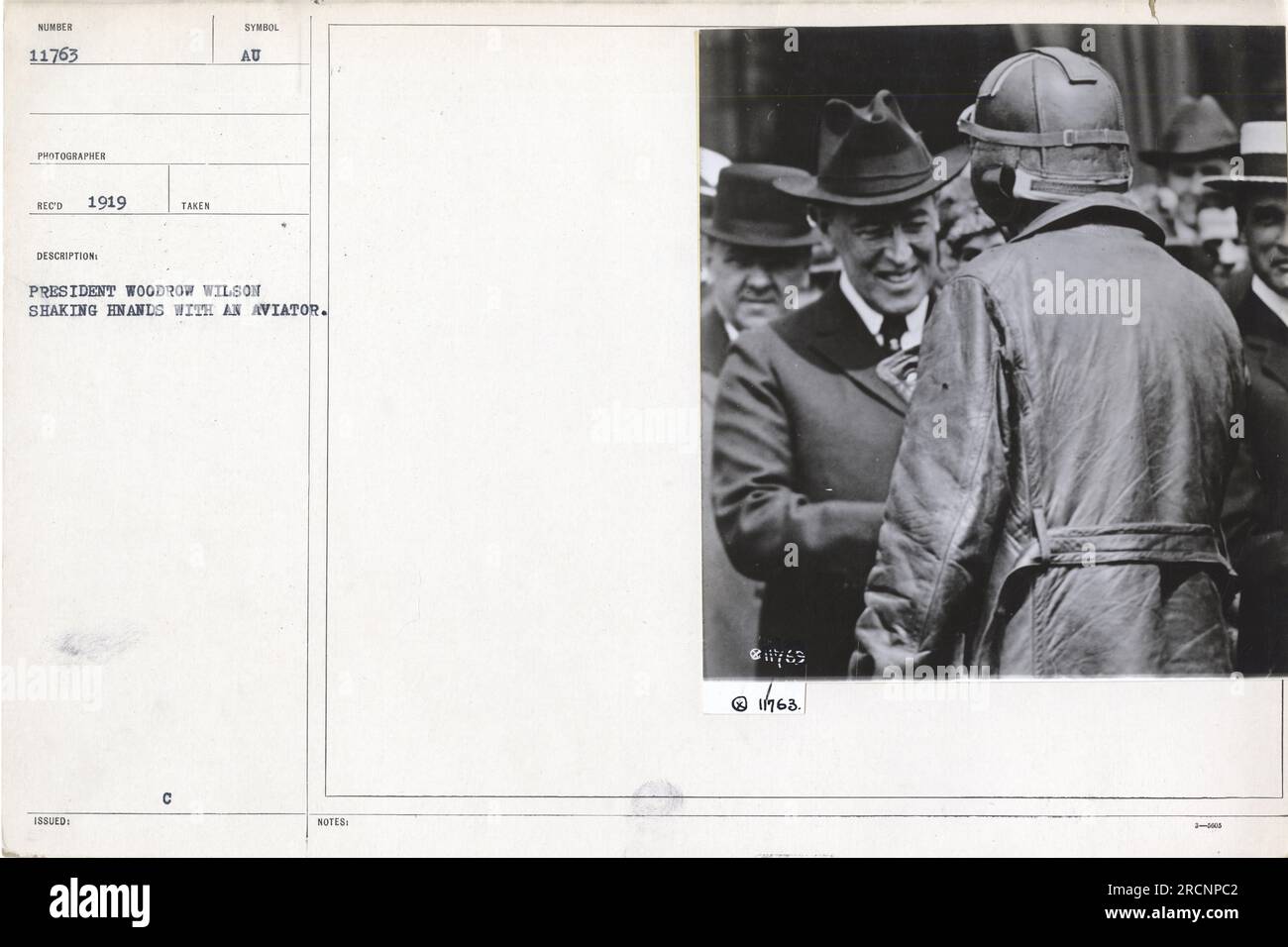 President Woodrow Wilson shaking hands with an aviator during World War ...