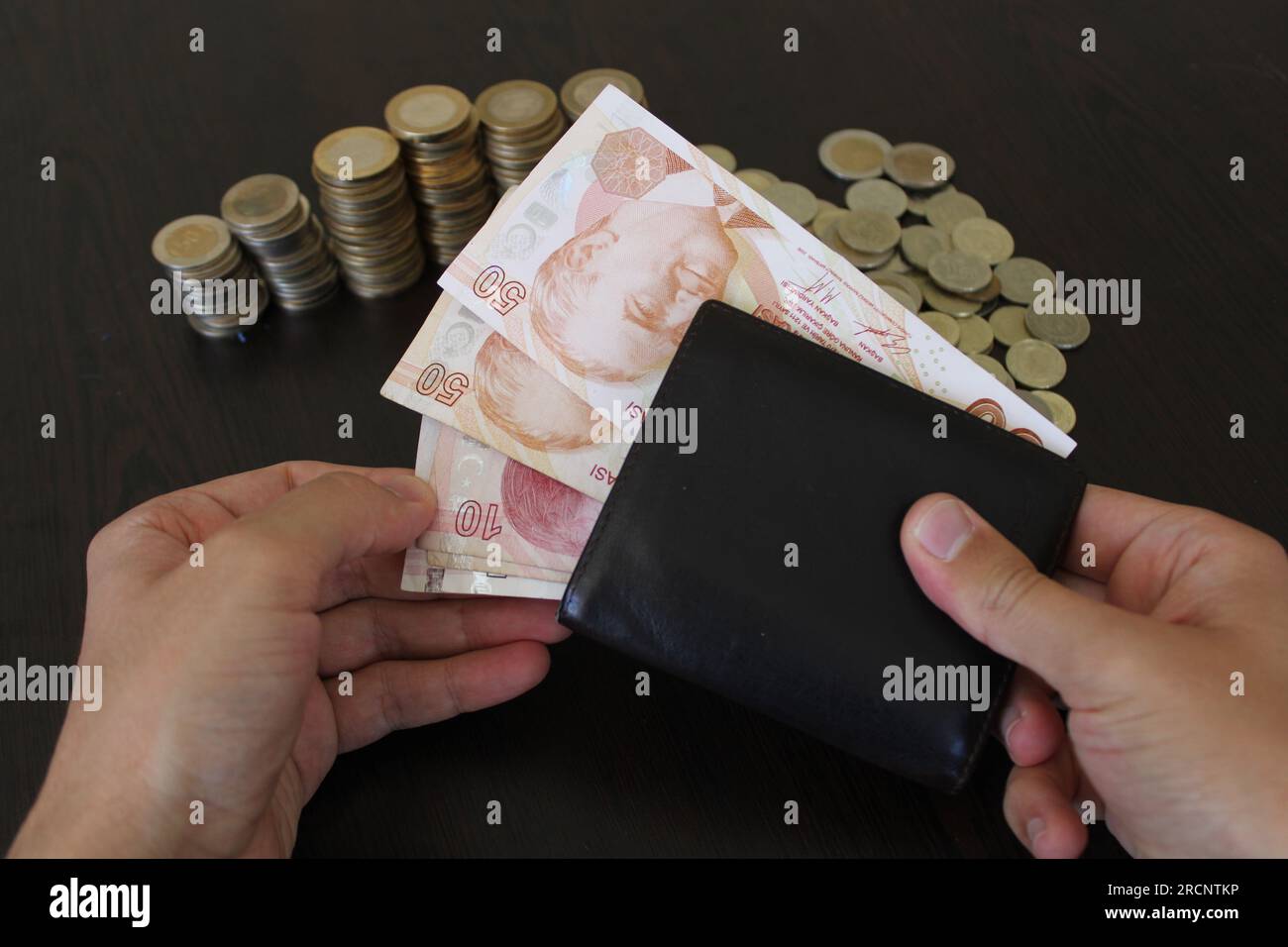 Man hand holding wallet close up. Poverty, cost control expenses, spent ...