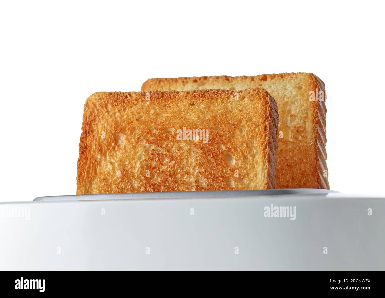 toasted bread slices in toaster close up Stock Photo - Alamy