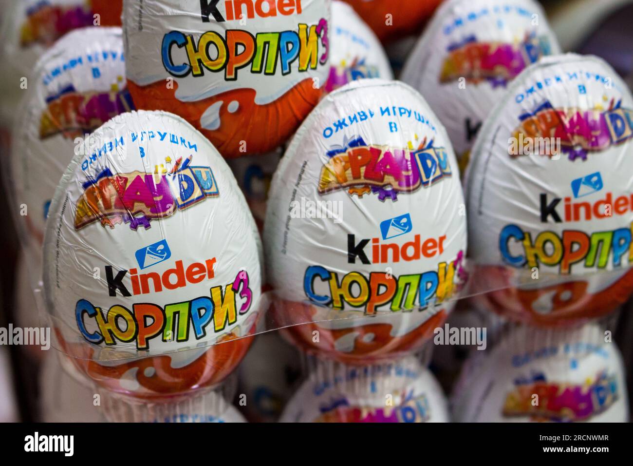 Russia - February 2021: Kinder surprise chocolate eggs on the window of ...