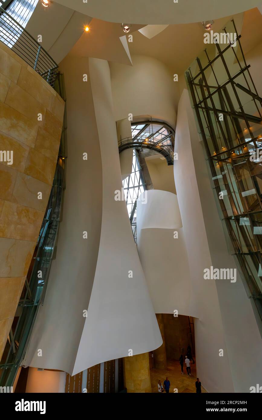 The Guggenheim Museum Bilbao designed by architect Frank Gehry, and ...
