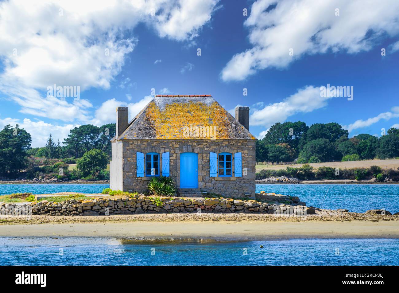 An old fishing house on small island in the Etel River, Ile de Saint ...