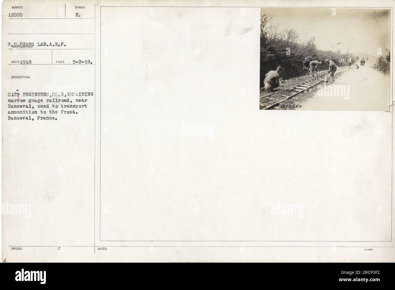 21st Engineers, Co.B, repairing narrow gauge railroad near Ranceval ...