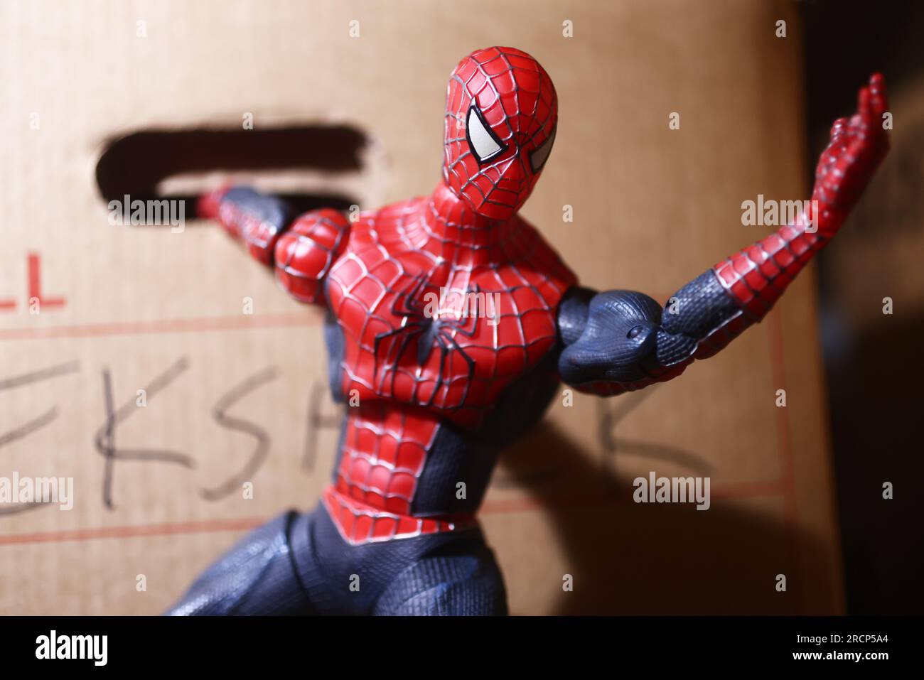 A box of toys in an attic of a house, here a Spider-Man Stock Photo - Alamy