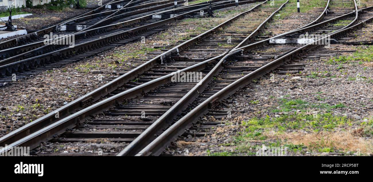 Railway tracks in front of the train station Stock Photo - Alamy