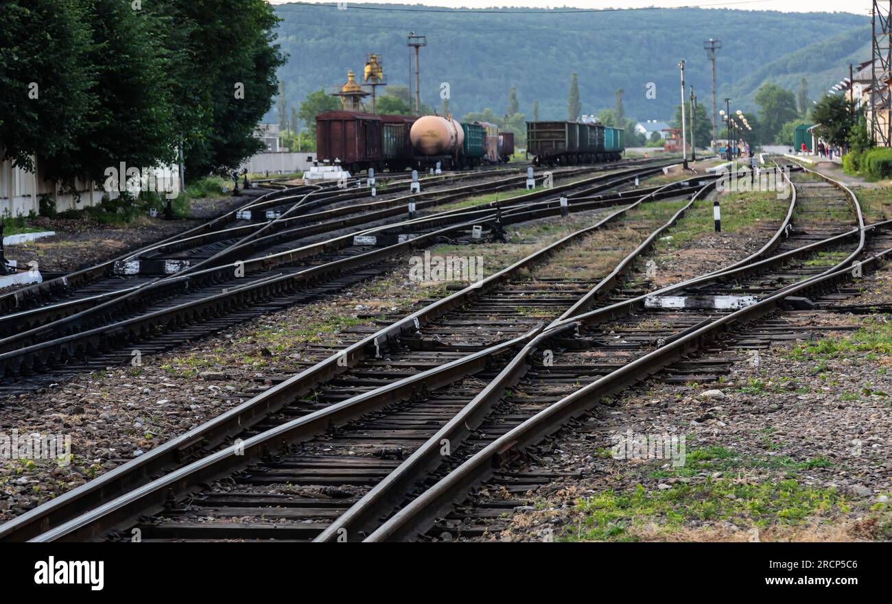 Railway tracks in front of the train station Stock Photo - Alamy