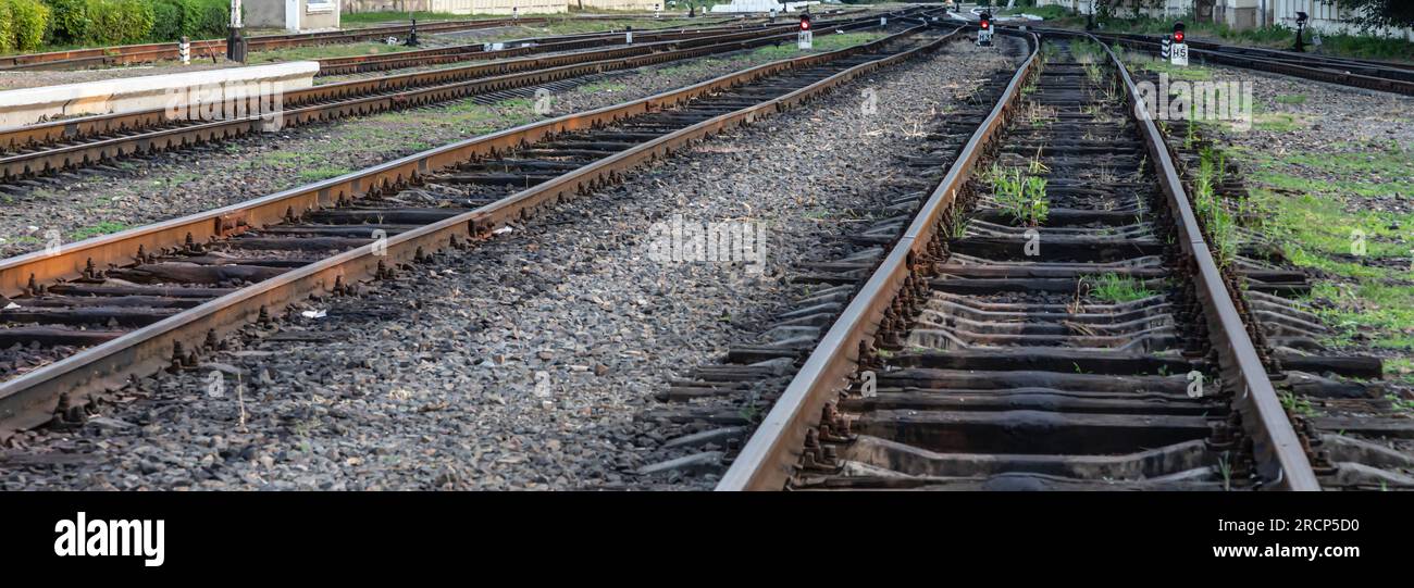 Railway tracks in front of the train station Stock Photo - Alamy