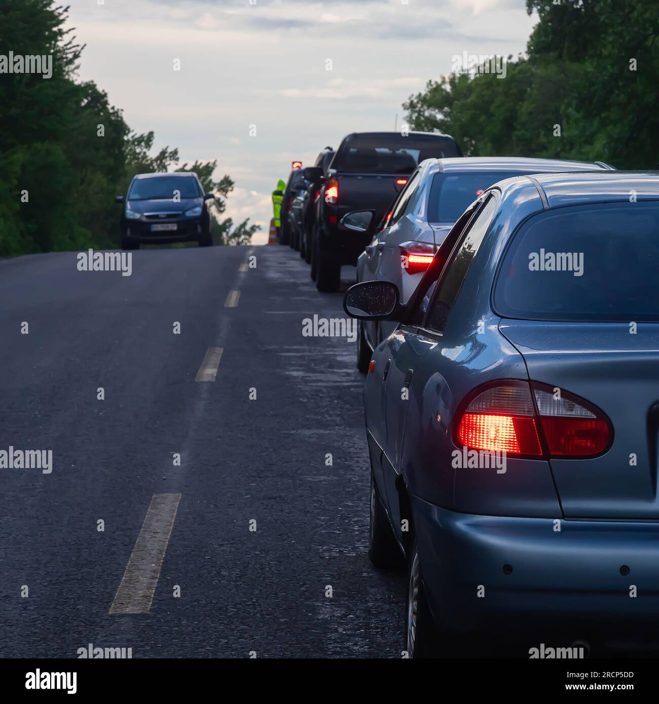 traffic jams on the road are associated with the repair of the roadway ...