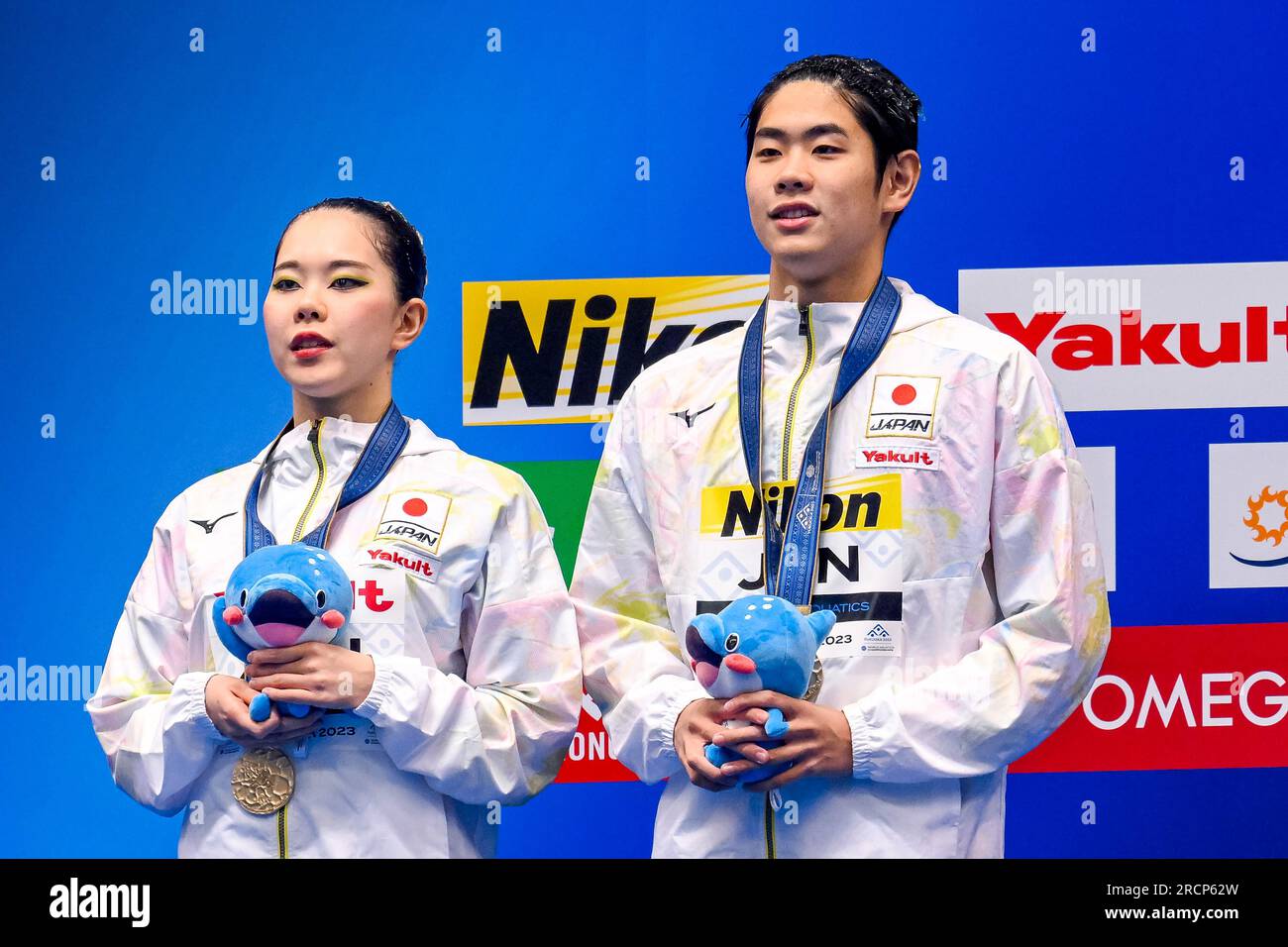 Fukuoka, Japan. 16th July, 2023. Tomoka Sato of Japan, Yotaro Sato of Japan stand with the gold ...