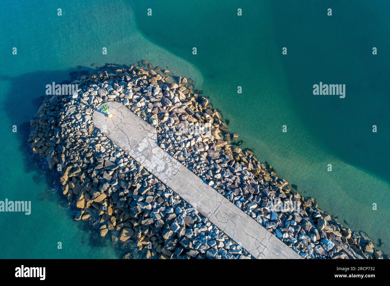zenithal view of a breakwater with calm sea and turquoise water Stock ...