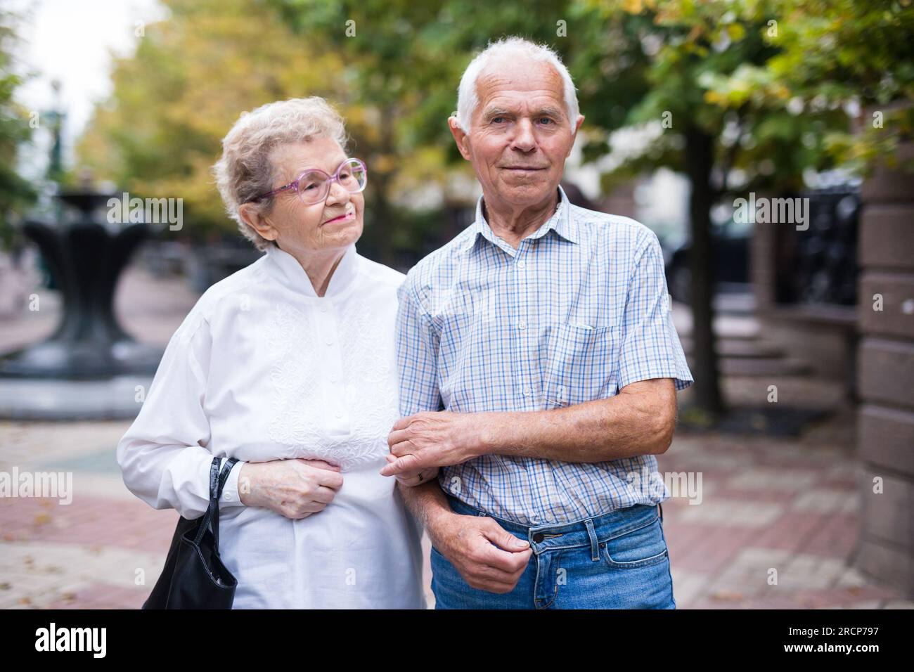 Two lovers strolling in beautiful hi-res stock photography and images ...